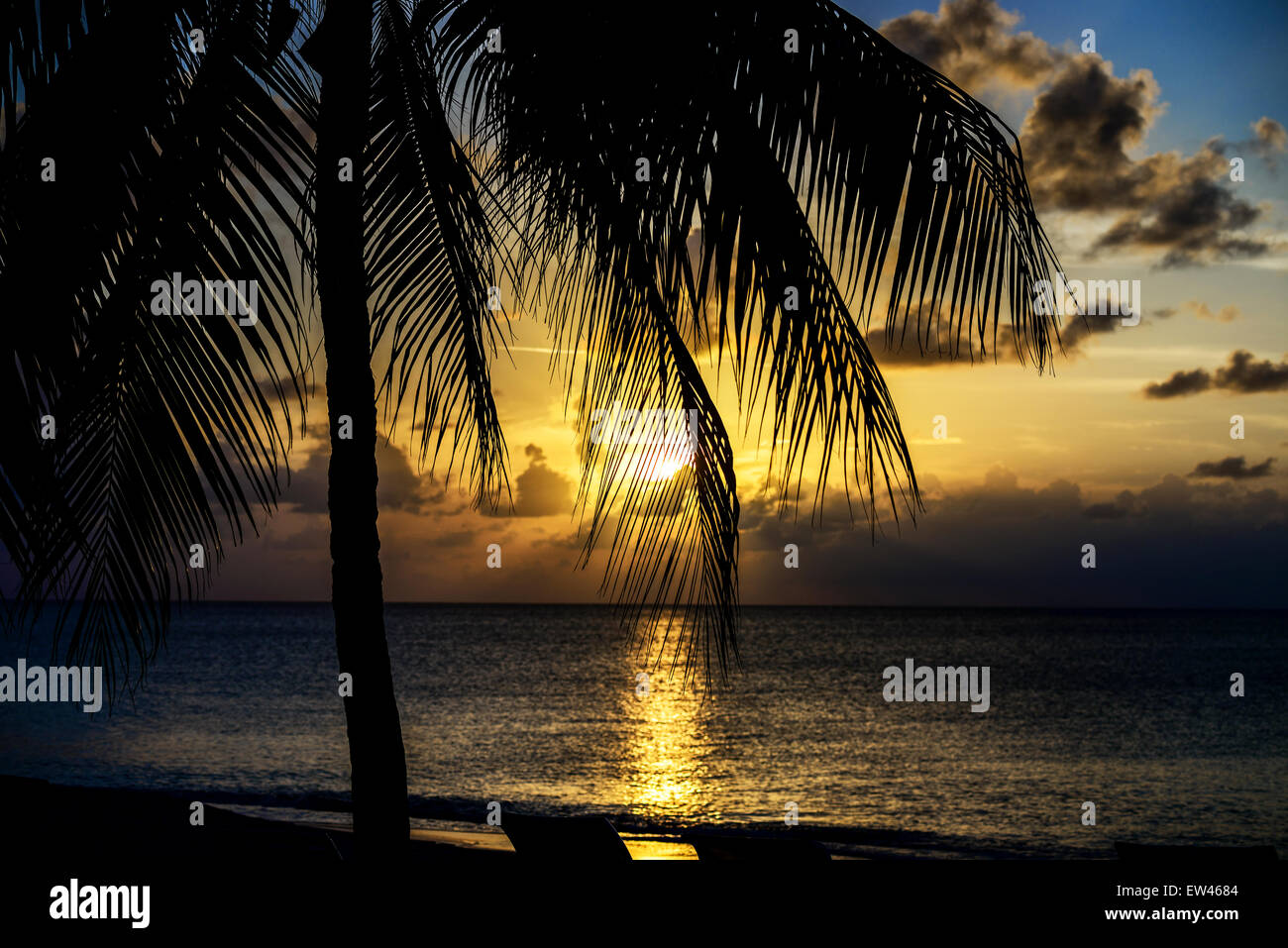 A golden sunset over the Caribbean sea viewed from St. Croix, U. S ...