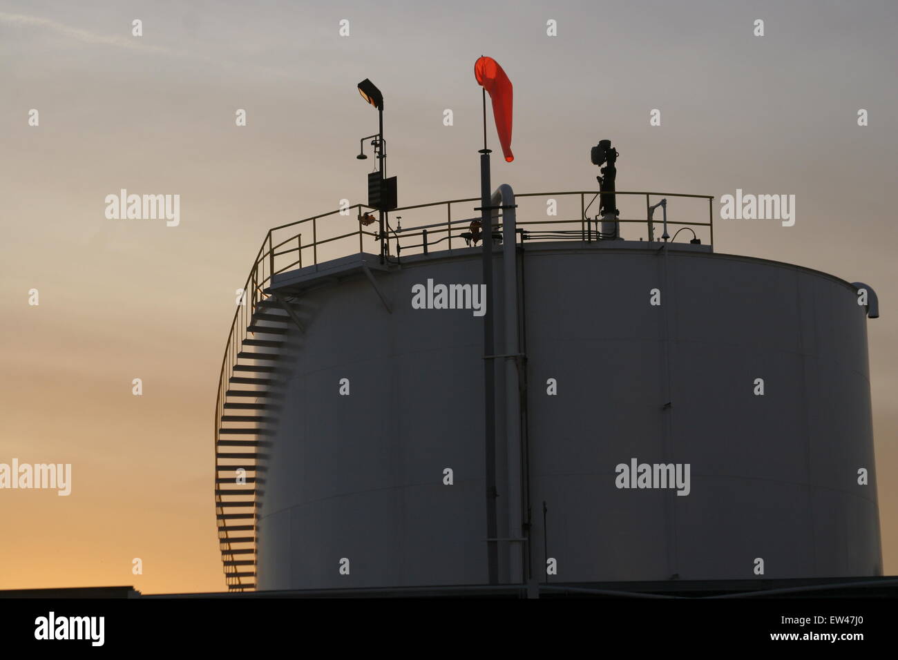 tank farm at sunset Stock Photo - Alamy