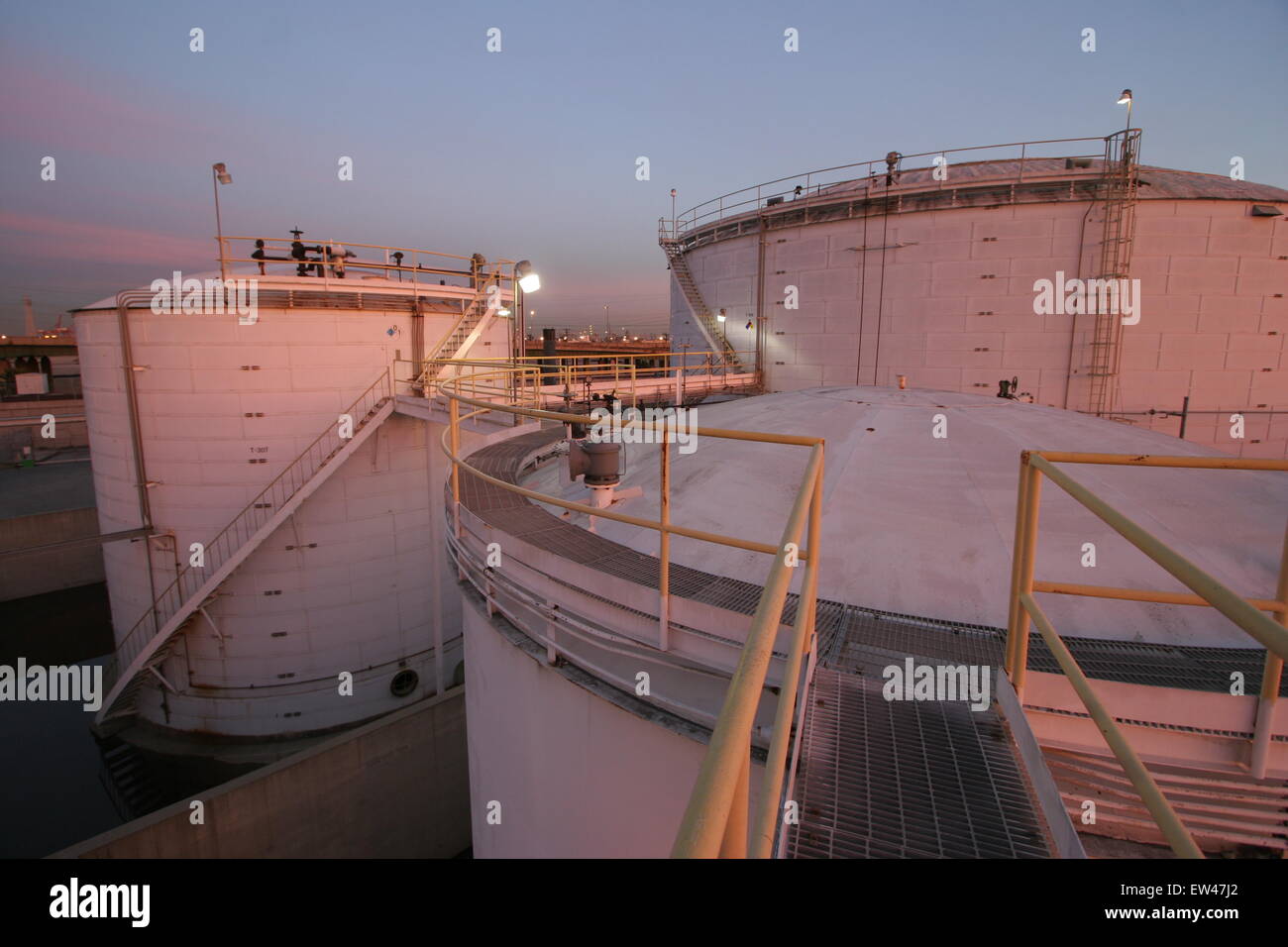 tank farm at sunset Stock Photo - Alamy
