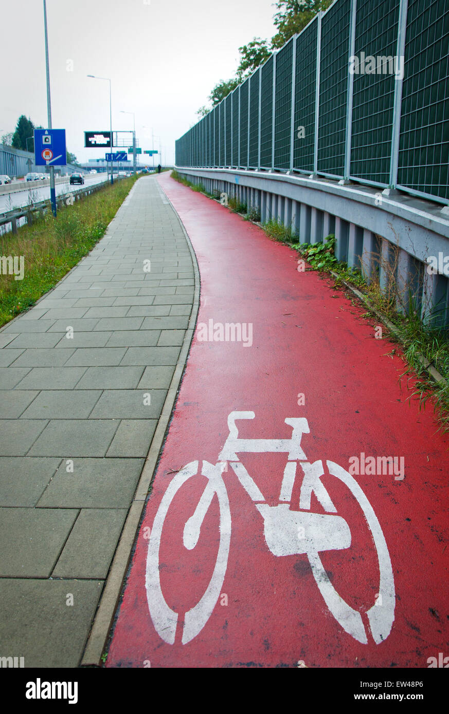 Red bicycle path Stock Photo - Alamy