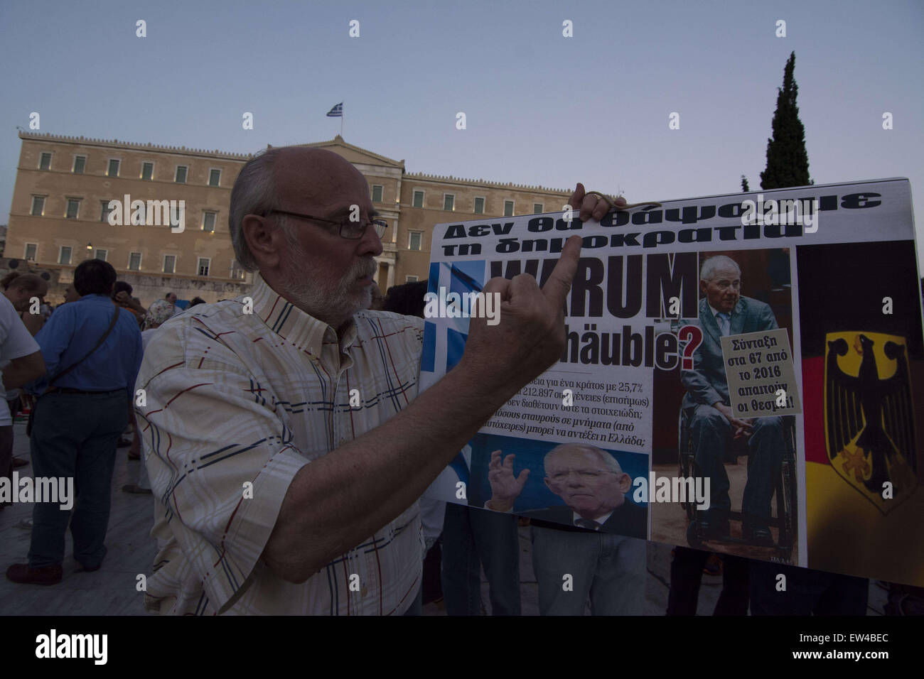 Athens, Greece. 17th June, 2015. An elderly man shows his middle finger ...
