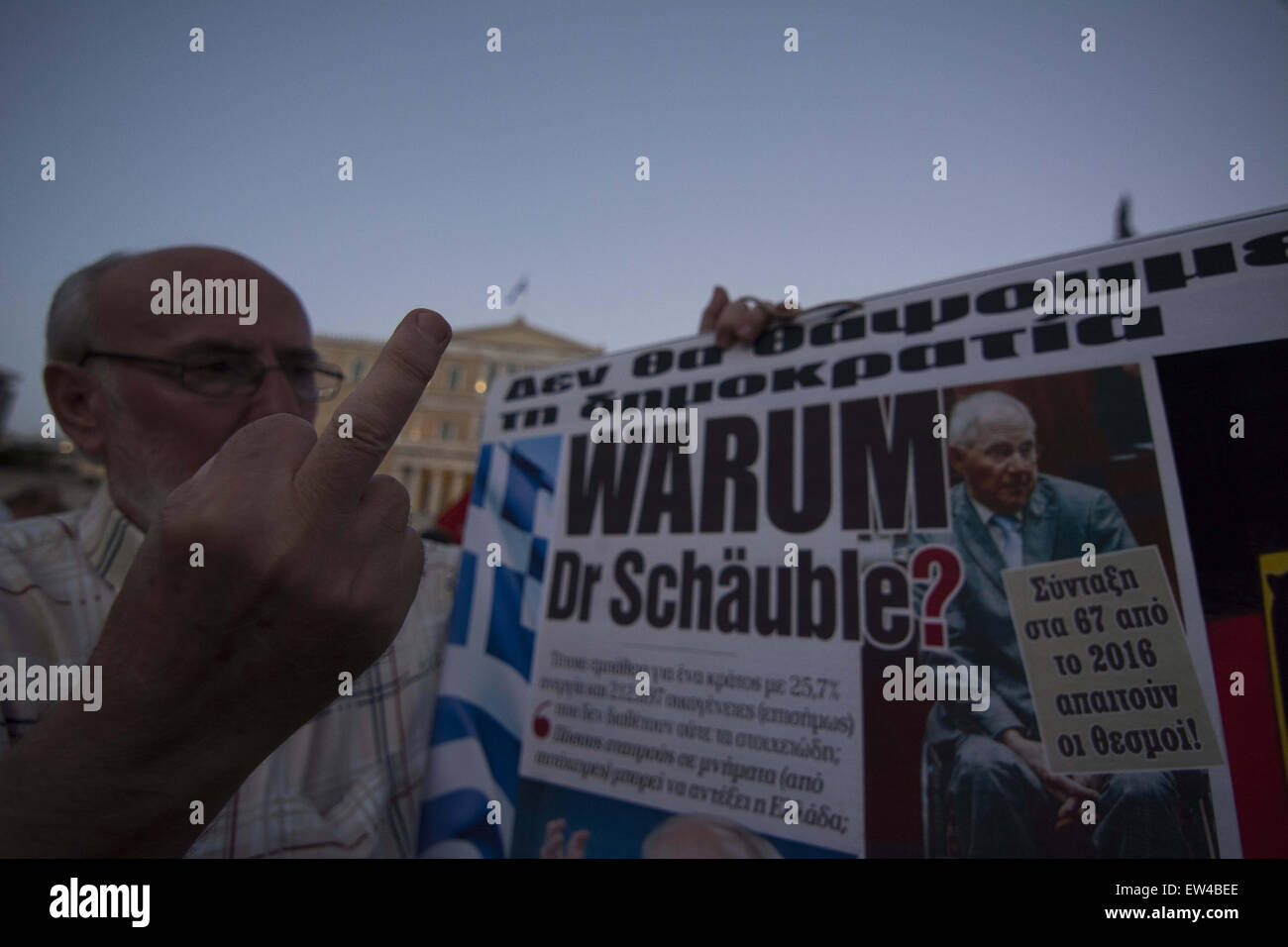 Athens, Greece. 17th June, 2015. An elderly man shows his middle finger ...
