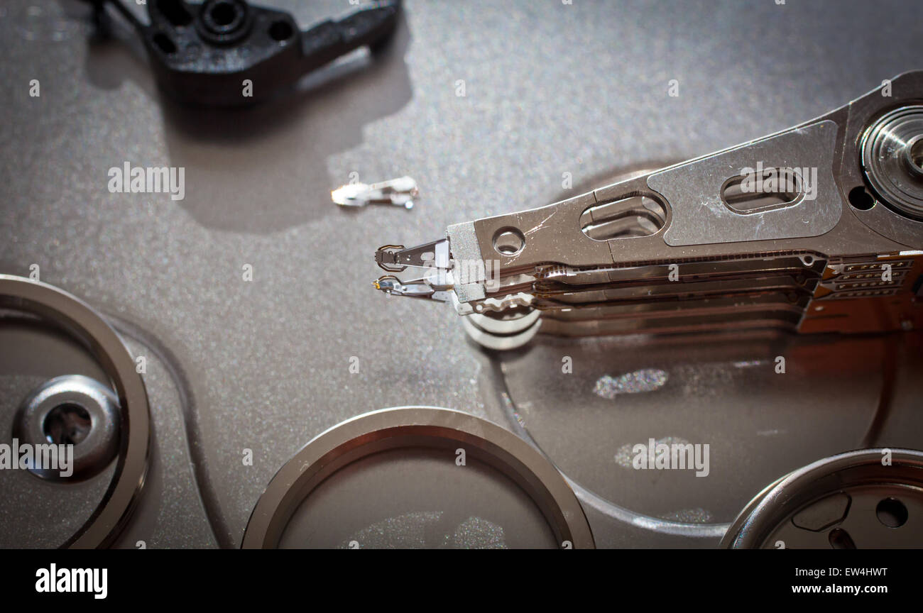 The internals of a computer hard drive - read-write heads, disc ...