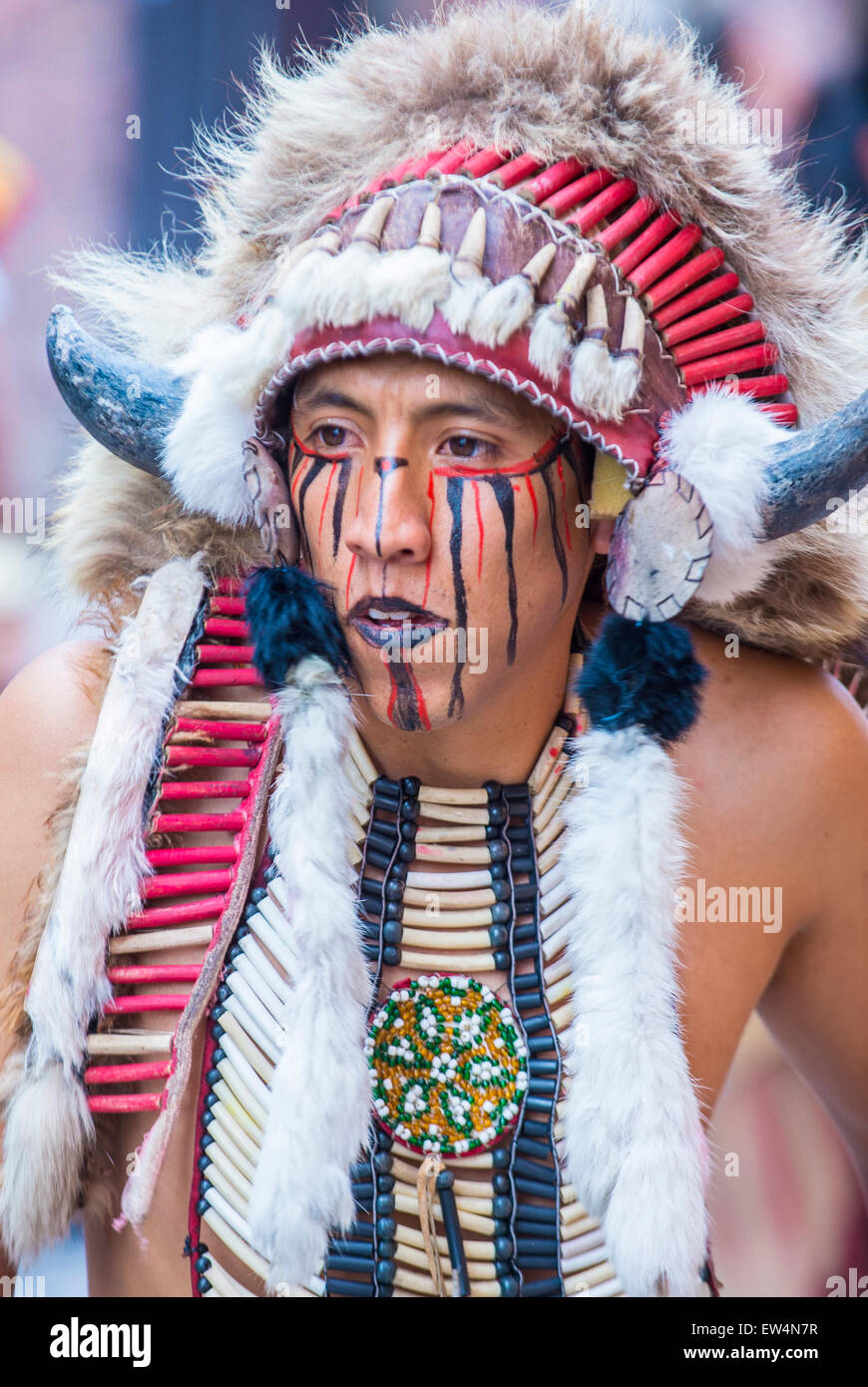 Native American with traditional costume participates at the festival ...