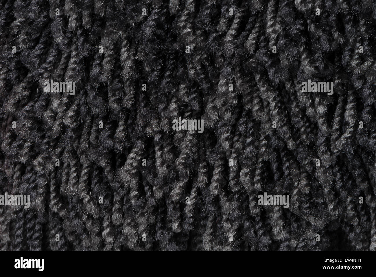 Closeup detail of black carpet texture background Stock Photo - Alamy