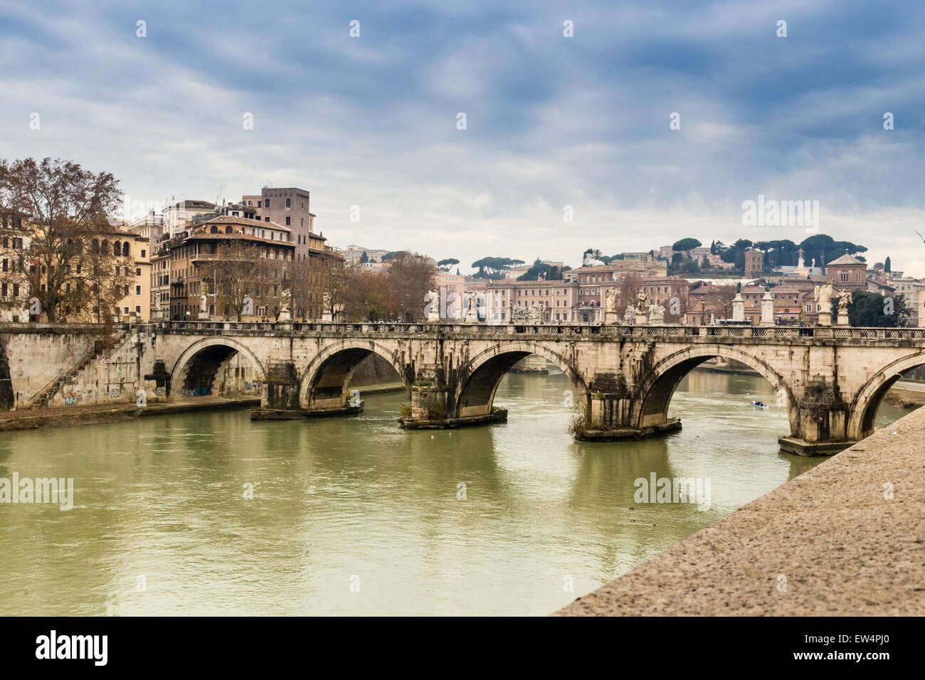 Bridge over the Tiber river in the center of Rome Stock Photo - Alamy