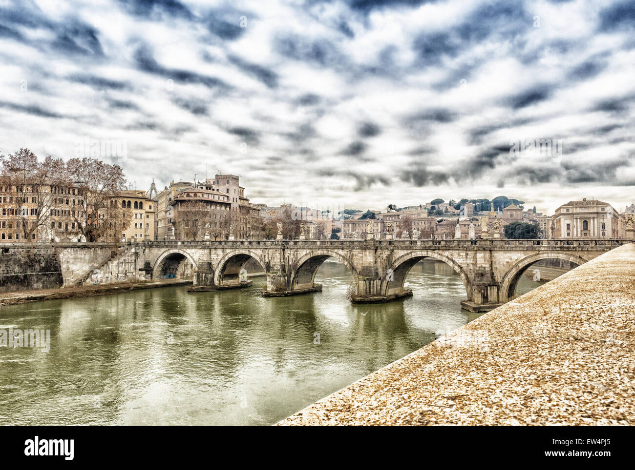 Bridge over the Tiber river in the center of Rome Stock Photo - Alamy