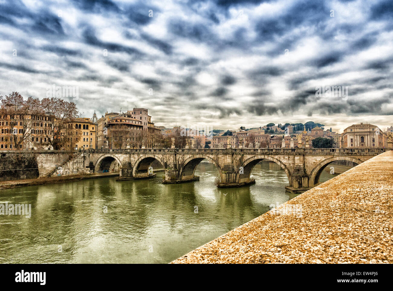 Bridge over the Tiber river in the center of Rome Stock Photo - Alamy