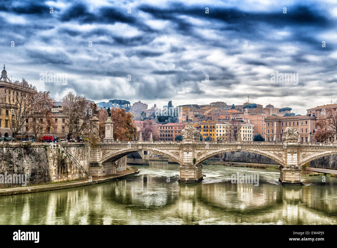 Bridge over the Tiber river in the center of Rome Stock Photo - Alamy