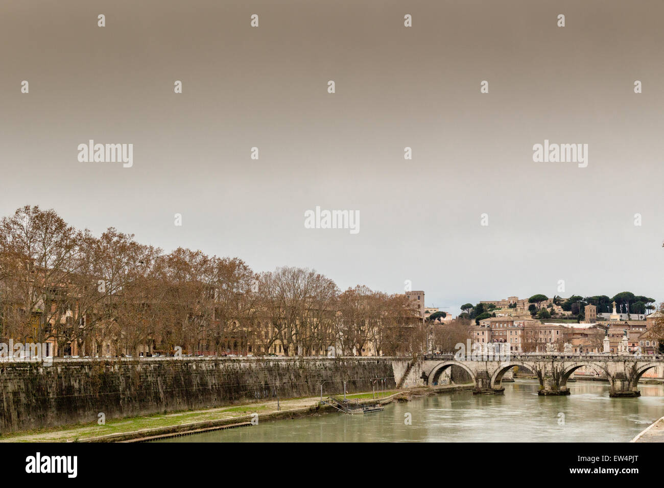 Bridge over the Tiber river in the center of Rome Stock Photo - Alamy