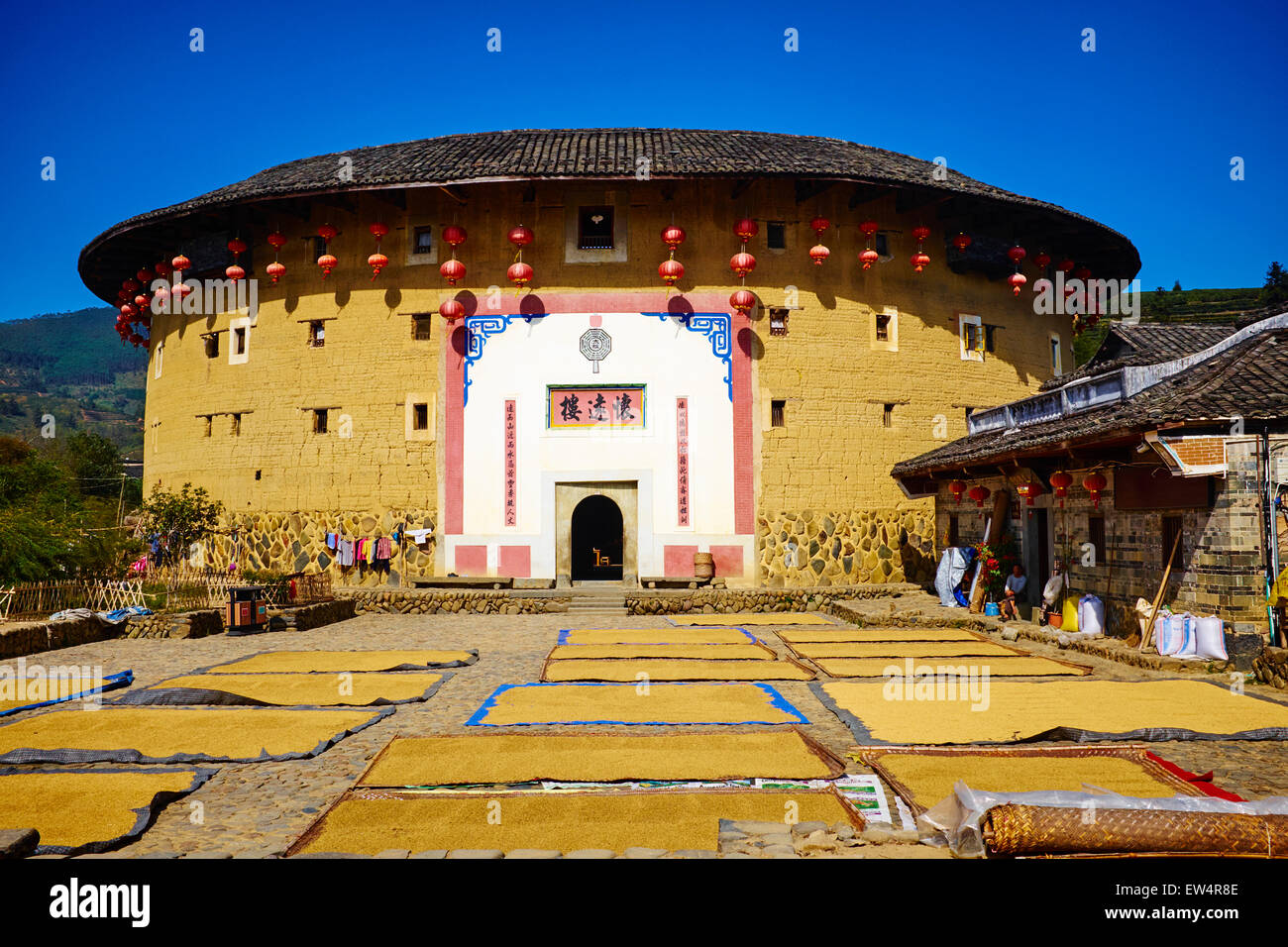 China, Fujian province, Huaiyuan Lou village, Tulou mud house. well ...