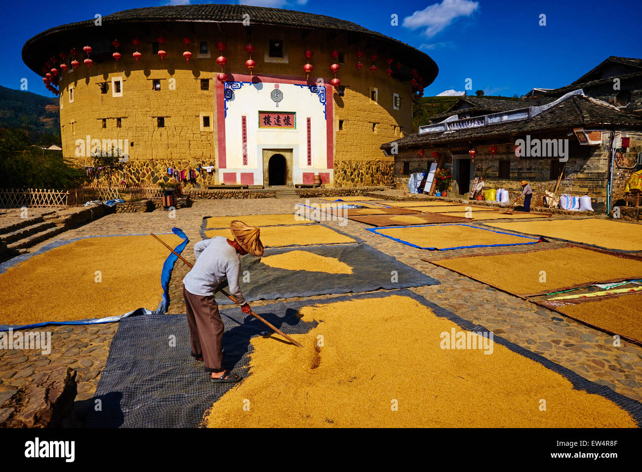 China, Fujian province, Huaiyuan Lou village, Tulou mud house. well ...