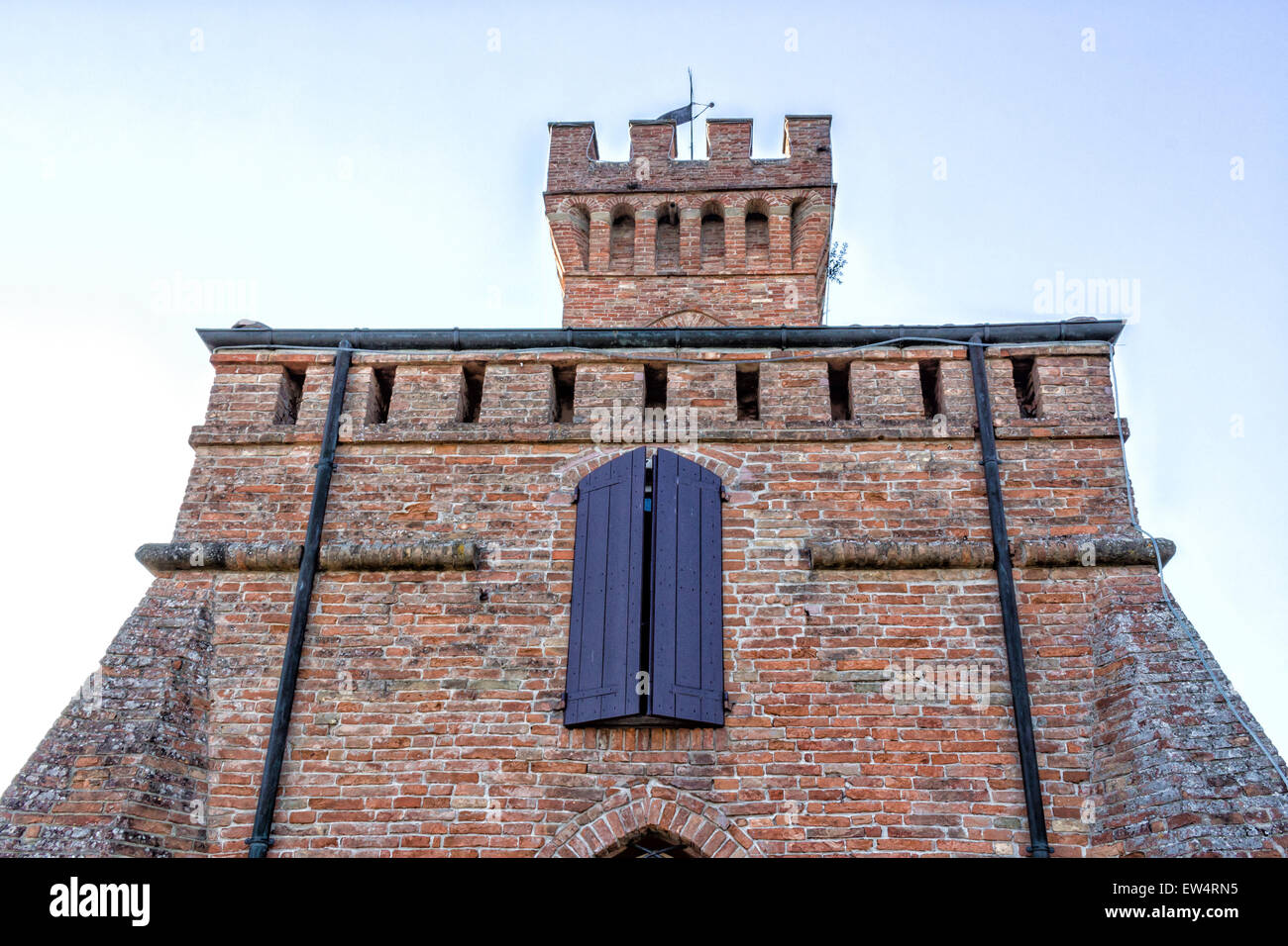 Medieval crenellated brick wall clock hi-res stock photography and ...