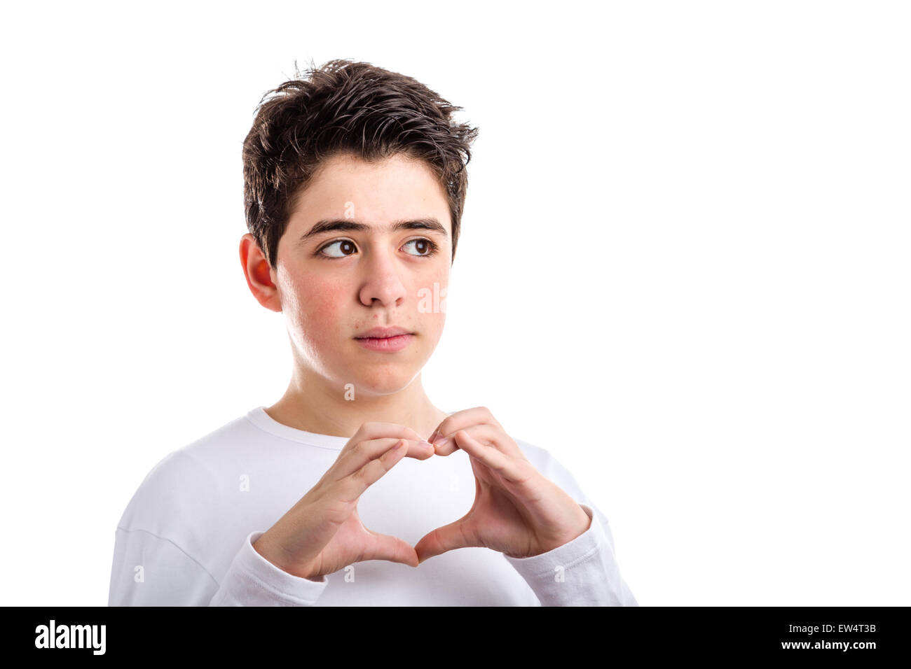 Caucasian young boy with acne-prone skin. in a white long sleeved t ...