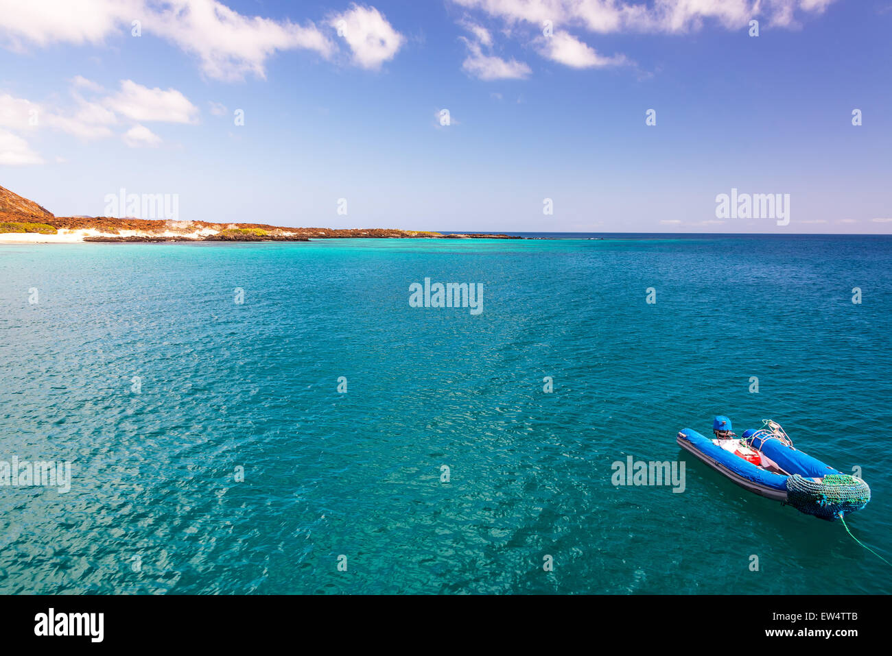 Beautiful blue and turquoise ocean in the Galapagos Islands with a ...
