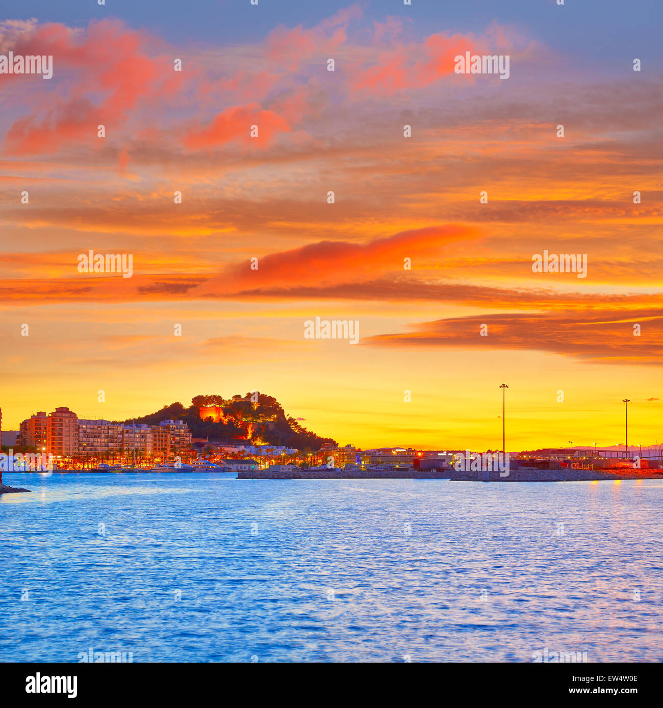 Denia sunset village skyline at dusk in Alicante at spain Stock Photo ...