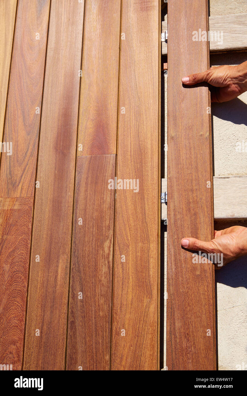 Ipe teak decking deck wood installation clips fasteners Stock Photo - Alamy