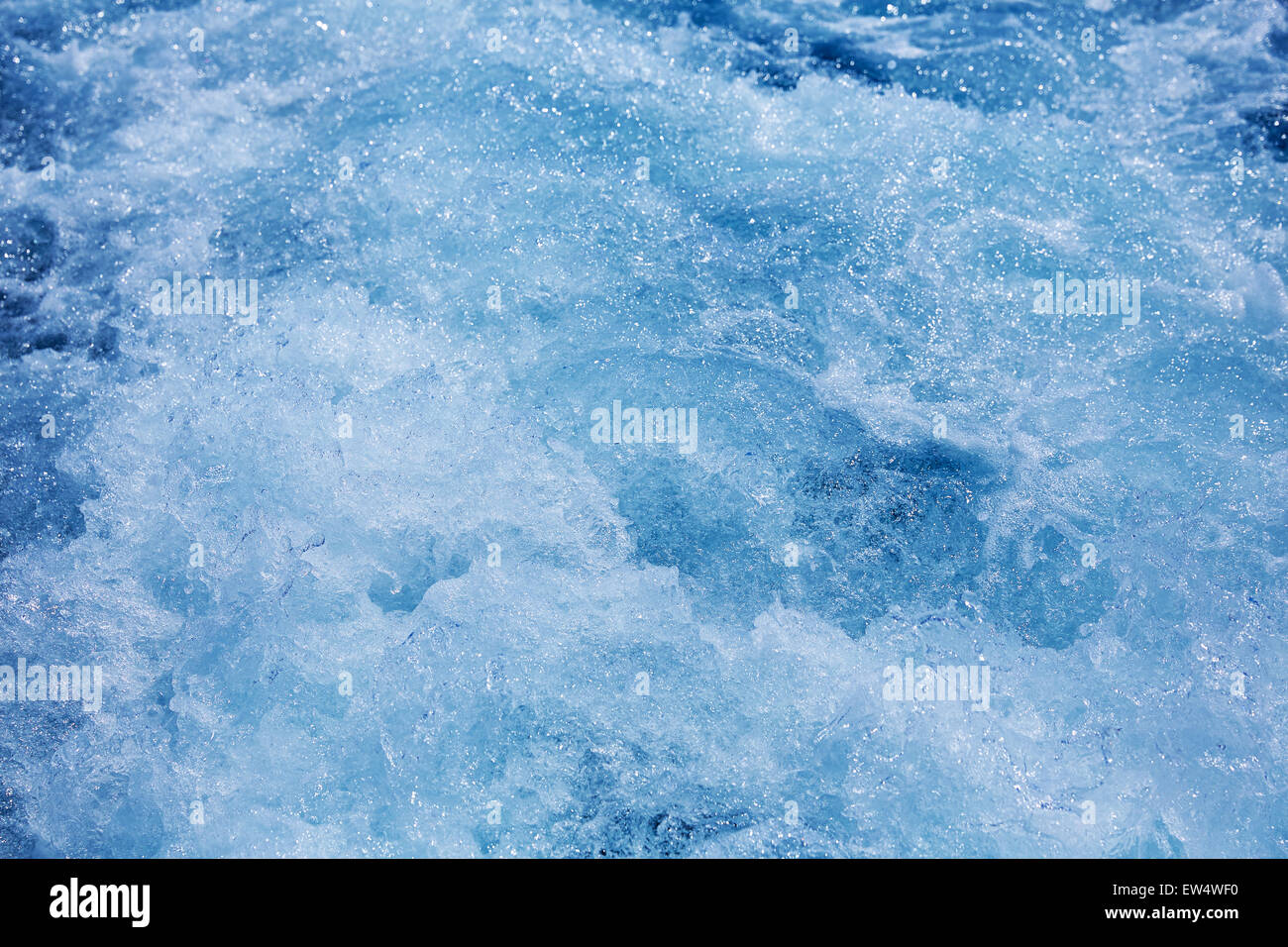 Blue sea ocean pro wake wash texture in blue saltwater Stock Photo - Alamy