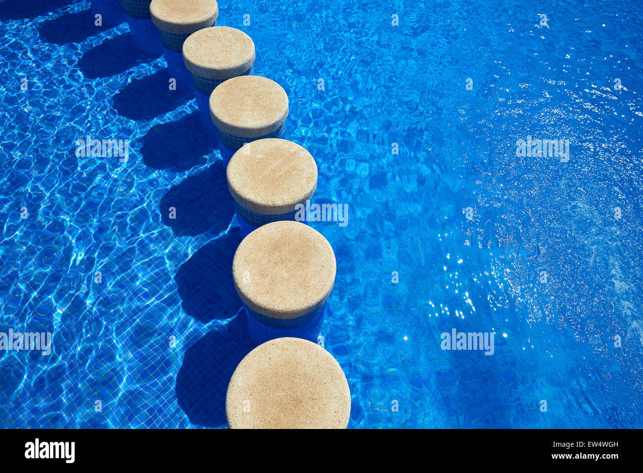 Blue tiles swimming pool water texture background Stock Photo - Alamy