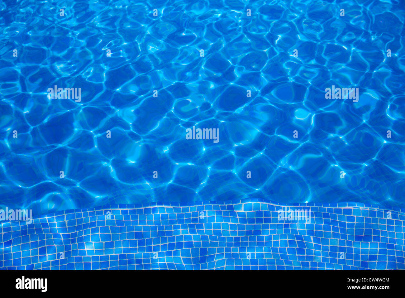 Blue tiles swimming pool water texture background Stock Photo - Alamy