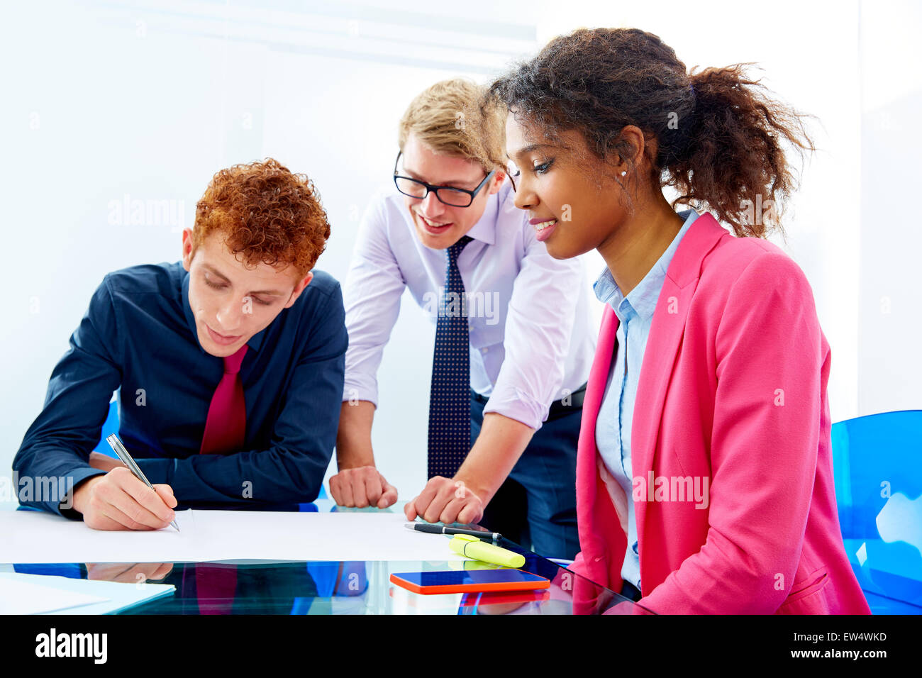Multi ethnic teamwork of young business people meeting working at ...