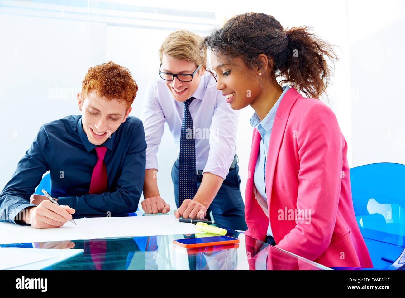 Multi ethnic teamwork of young business people meeting working at ...