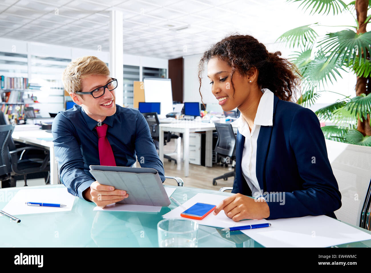 multi ethnic business people teamwork with touch pad young multiracial ...
