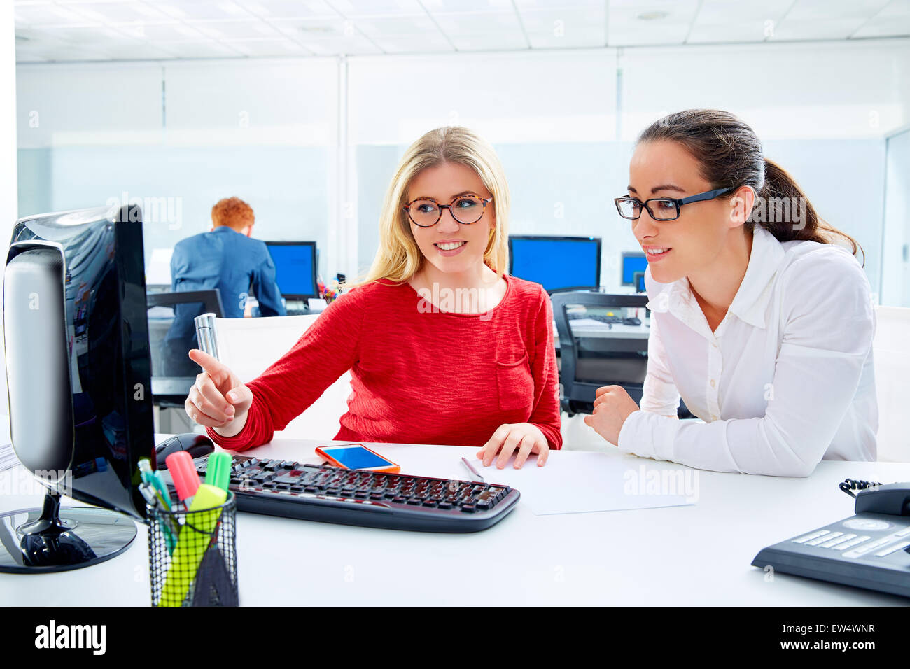 Businesswomen team working at offce desk with computer teamwork Stock ...