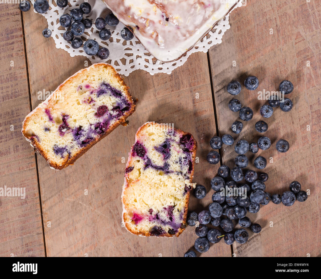 Blueberry coffee cake roll with slice and blueberries Stock Photo - Alamy