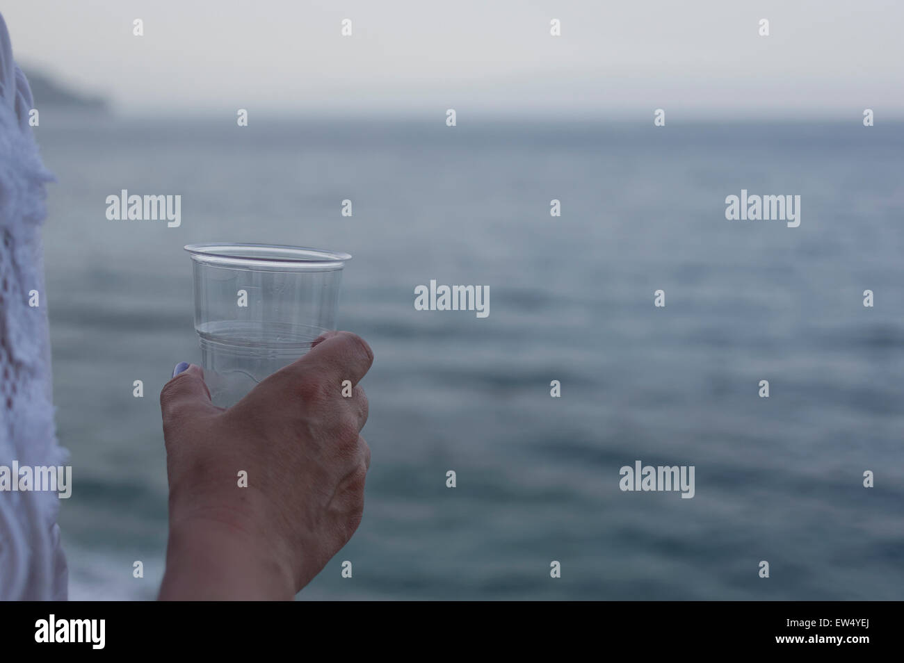 Glass drinks in hand hi-res stock photography and images - Alamy