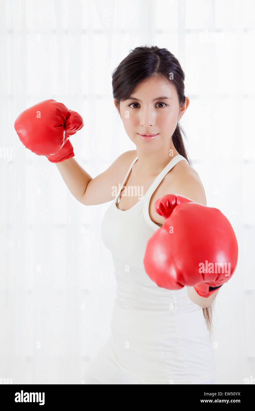Women boxing on building hi-res stock photography and images - Alamy