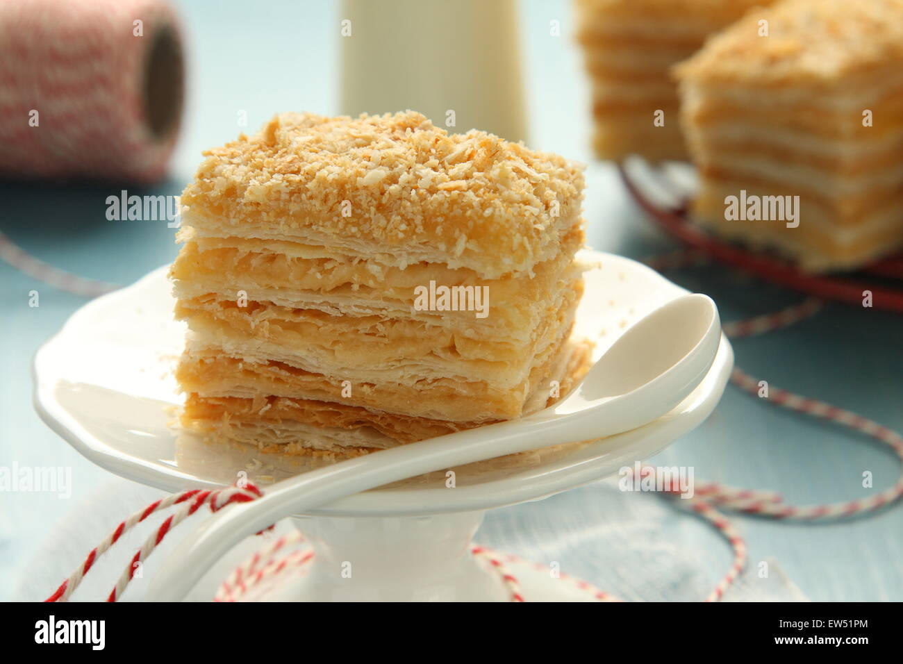 Piece of Napoleon cake – layer cake from puff pastry with custard cream ...