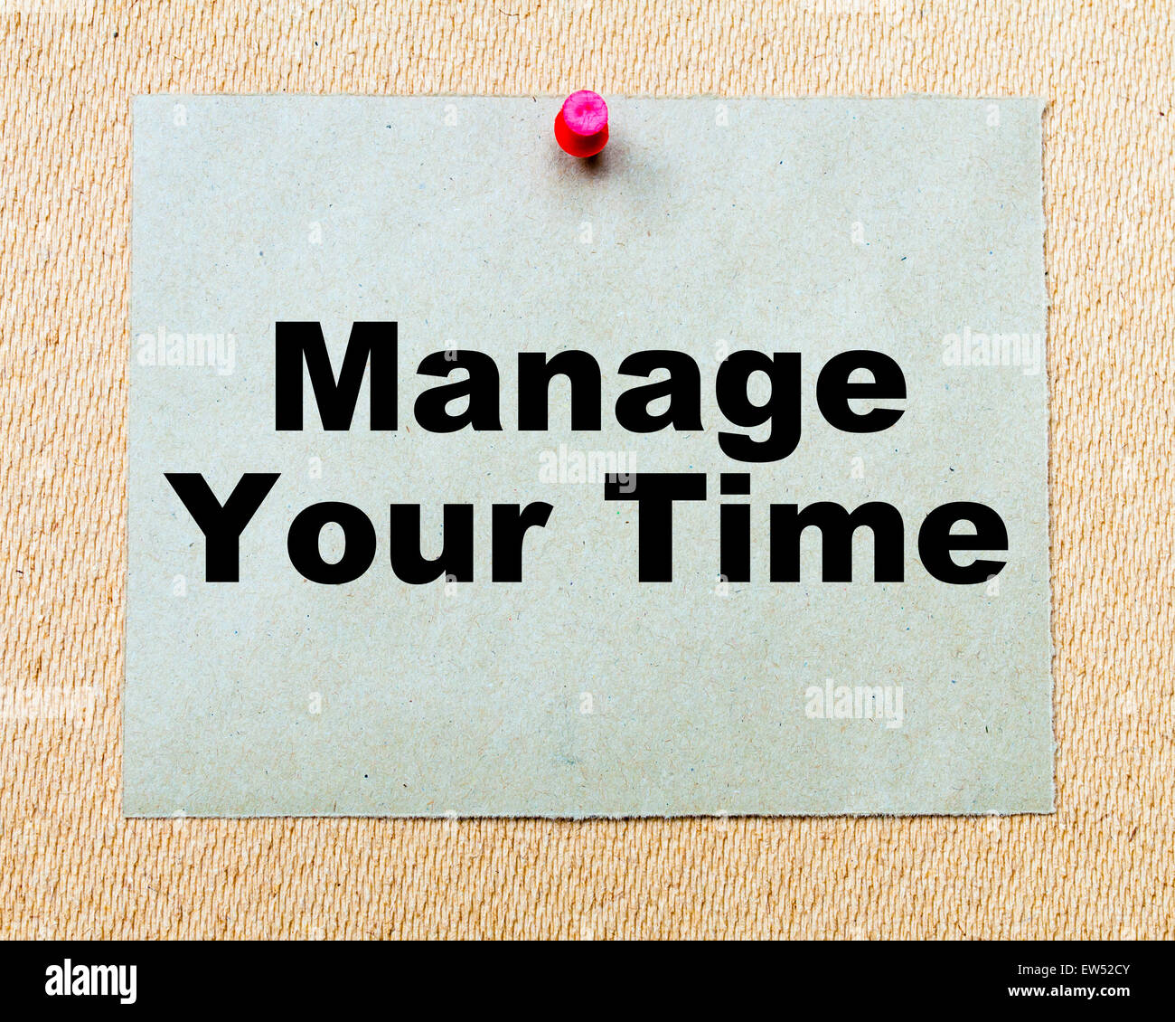 Manage Your Time written on paper note pinned with red thumbtack on ...