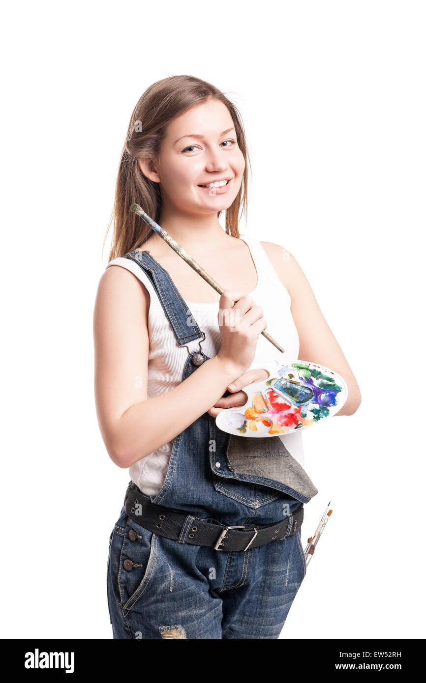 Artist woman with paint palette keeping brush Stock Photo - Alamy