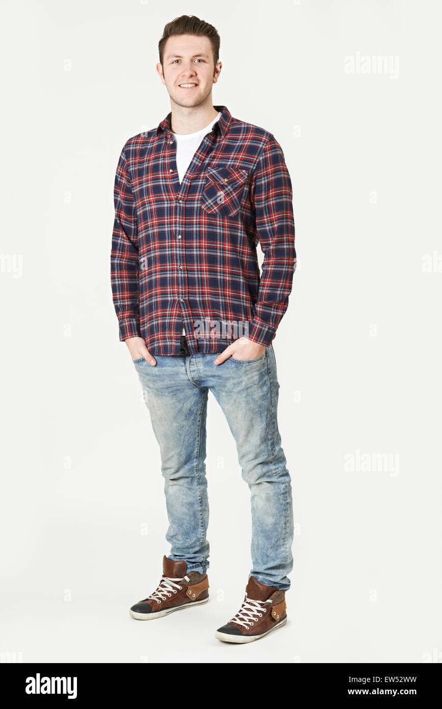 Full Length Portrait Of Man Standing In Studio On White Background ...