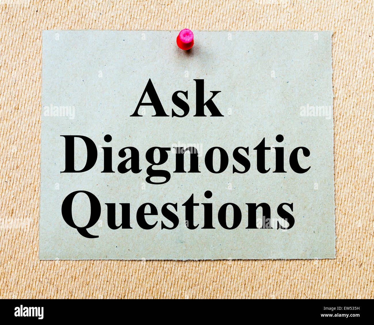 Ask Diagnostic Questions written on paper note pinned with red ...