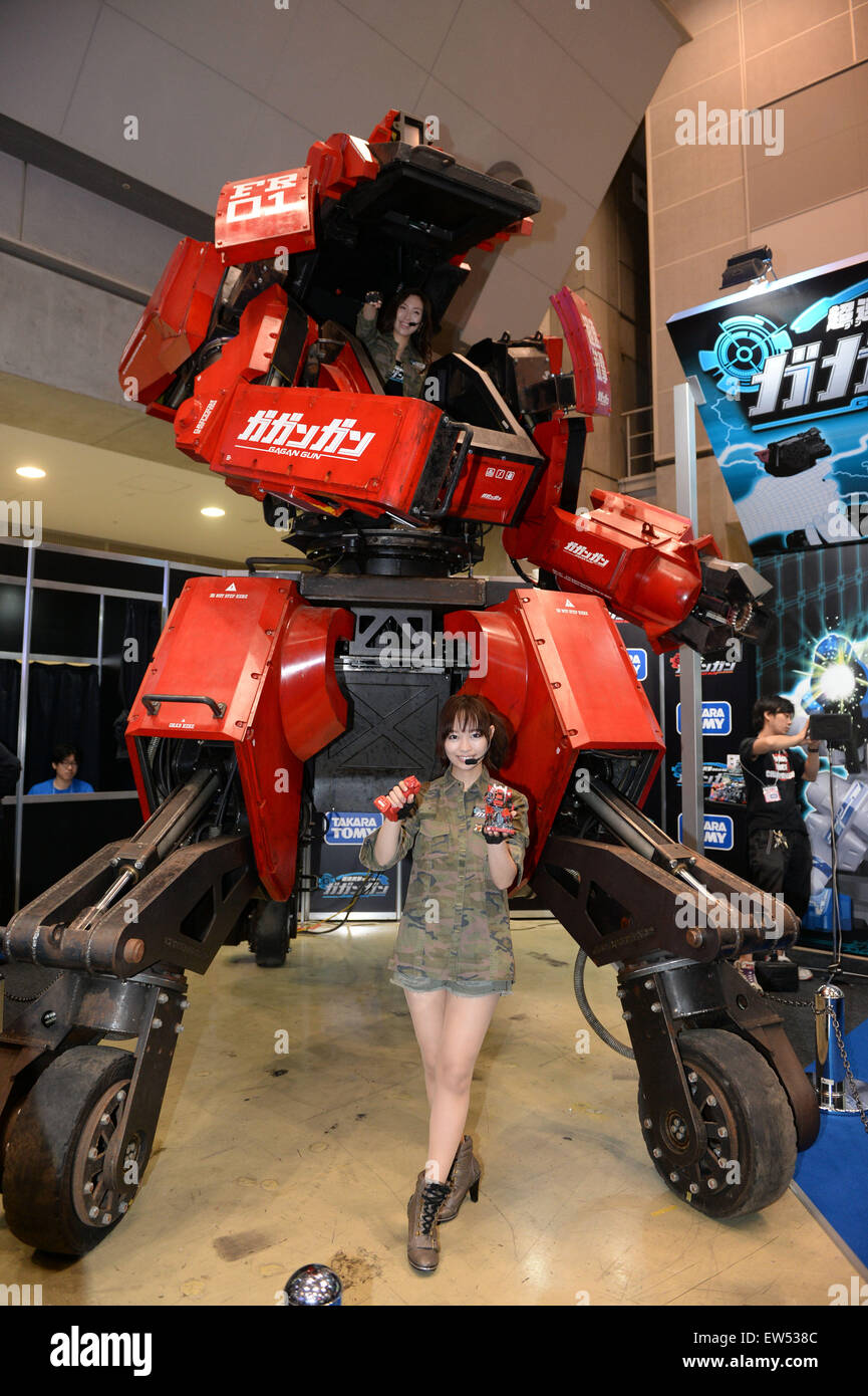Tokyo, Japan. 18th June, 2015. Models present a giant toy during the ...