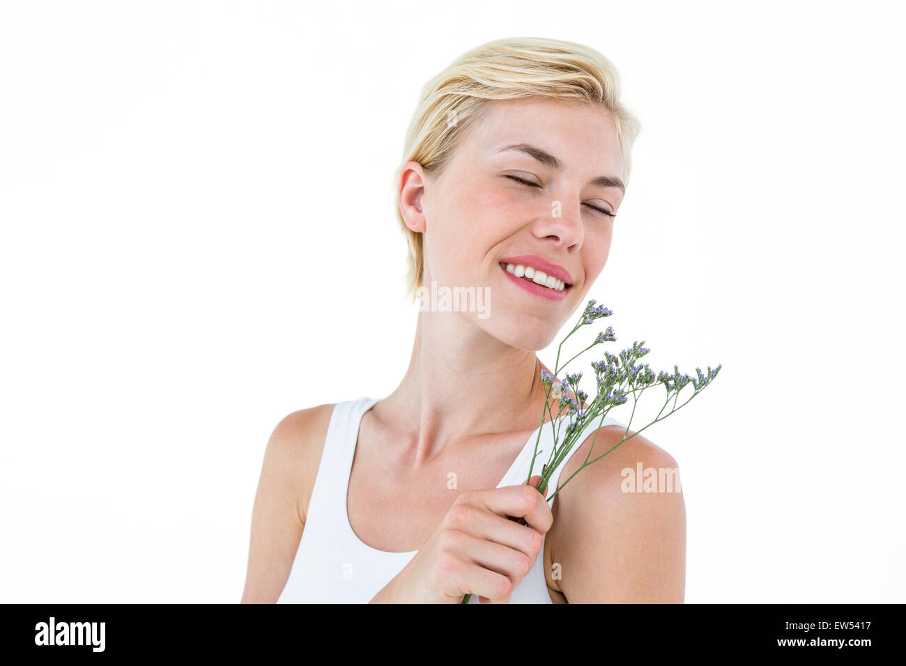 Beautiful woman smelling clean hi-res stock photography and images - Alamy