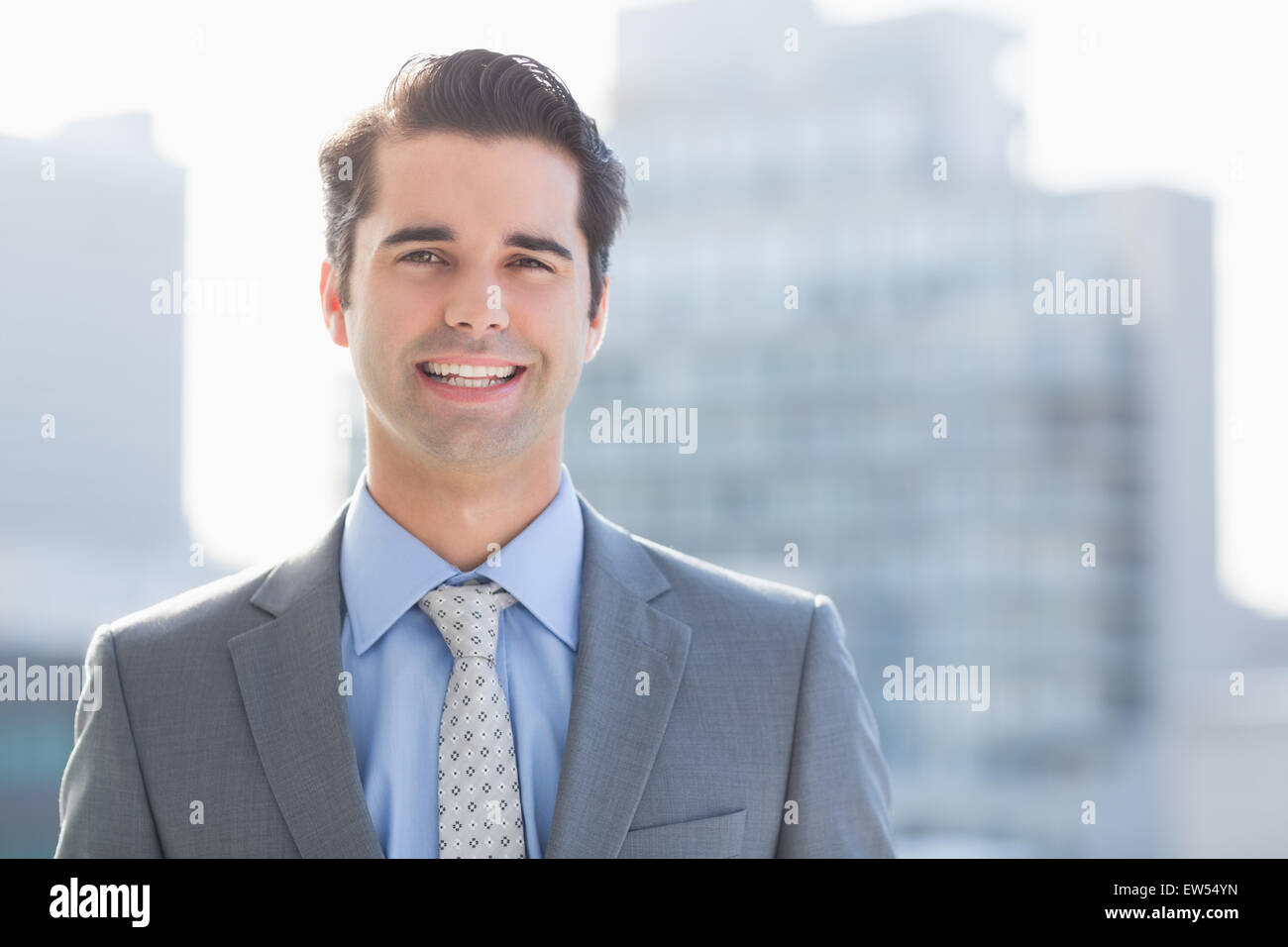Smiling businessman outdoors hi-res stock photography and images - Alamy