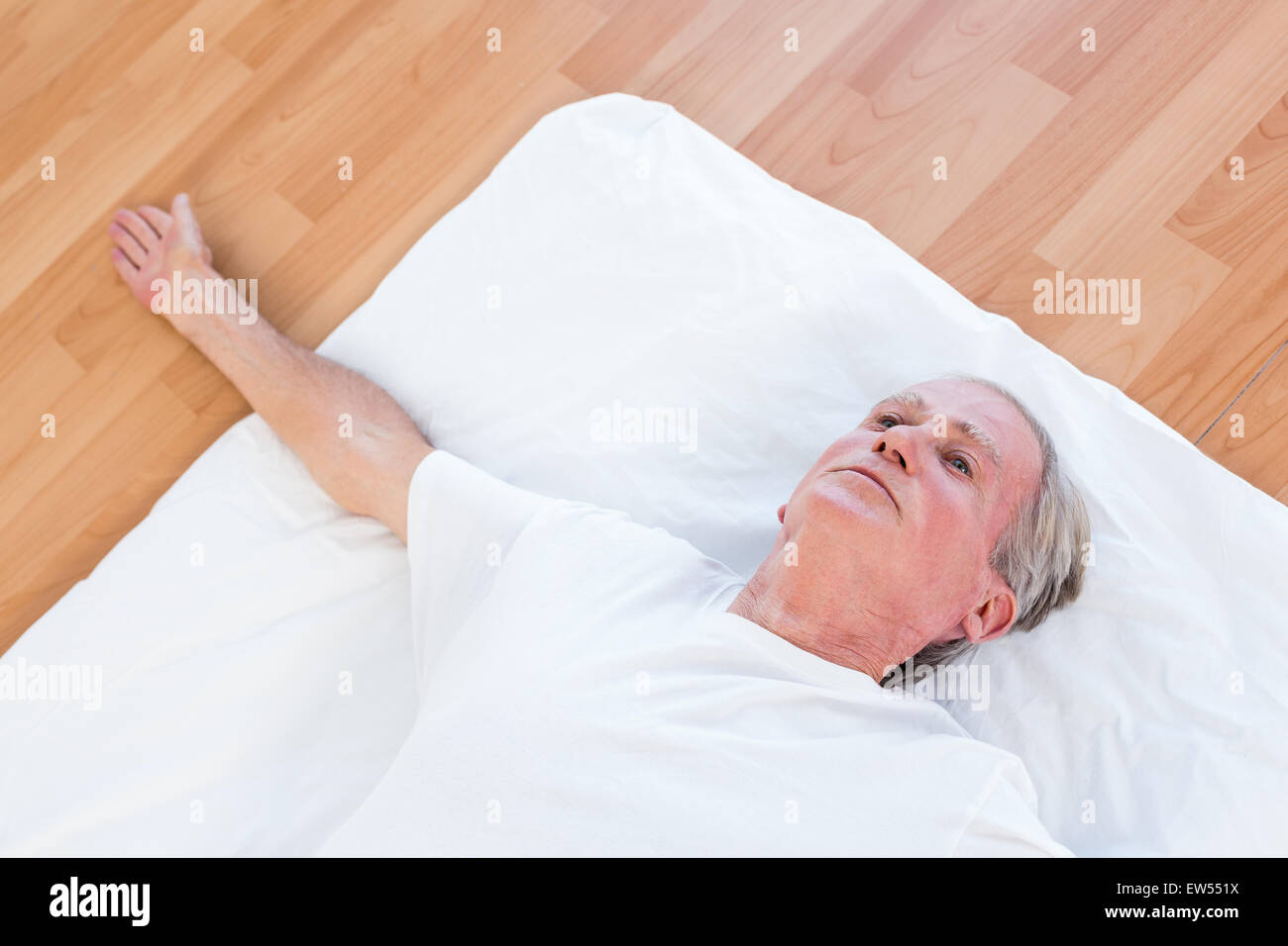 Old man relaxing with open eyes Stock Photo - Alamy