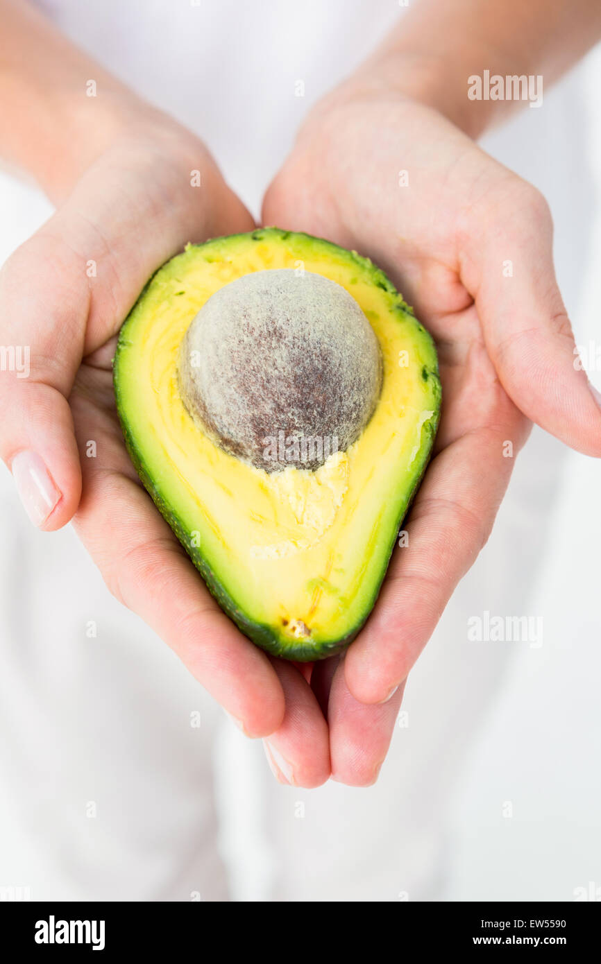 Healthy woman eating avocado hi-res stock photography and images - Alamy