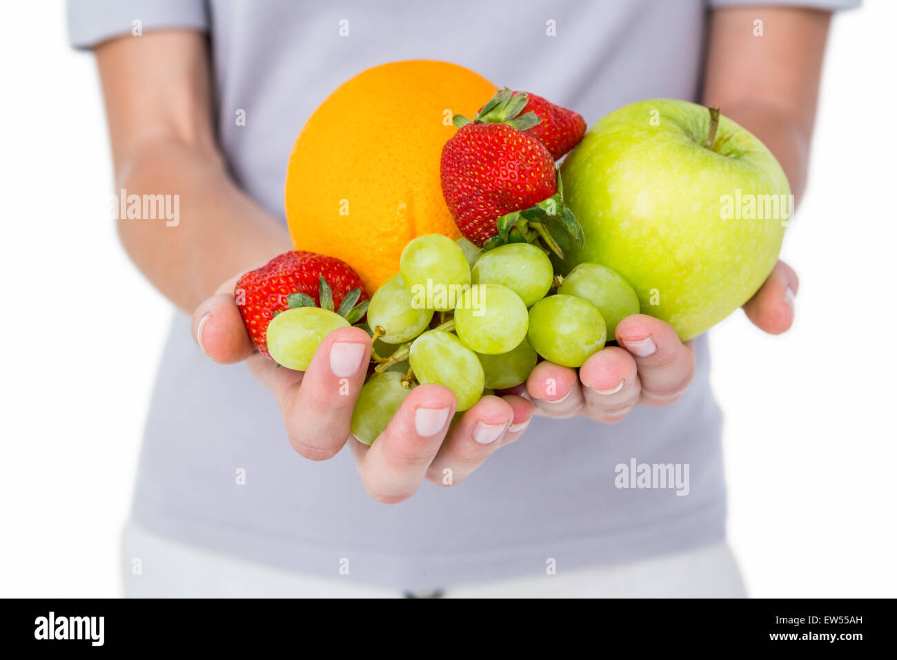 Woman holding fruits Stock Photo - Alamy