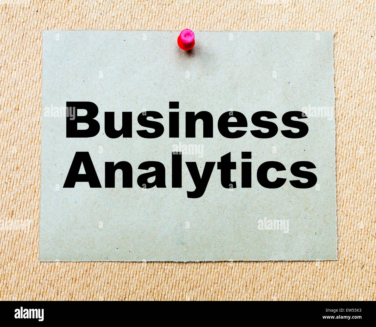 Business Analytics written on paper note pinned with red thumbtack on ...
