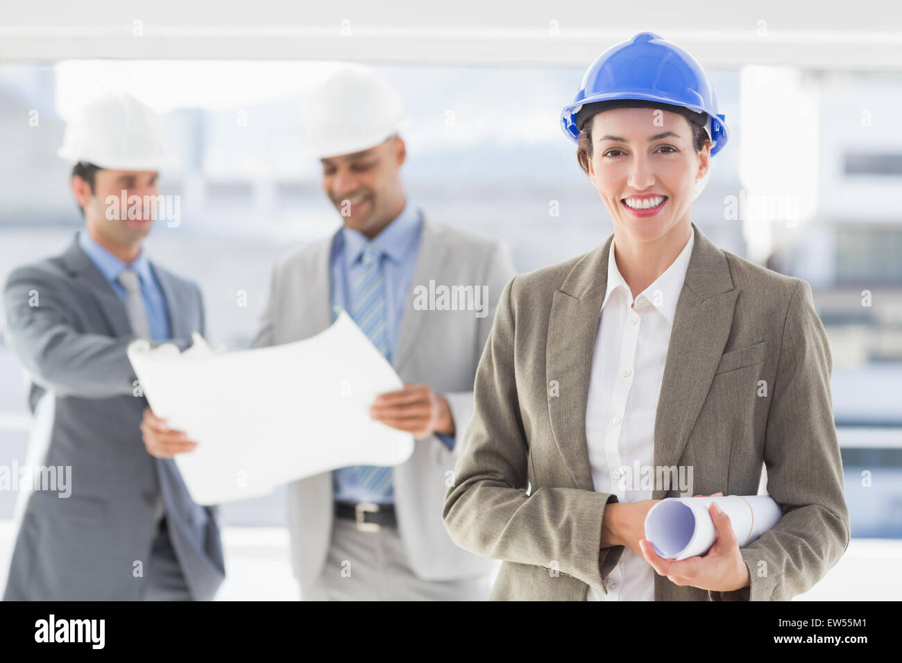 Man holding blueprint hi-res stock photography and images - Alamy