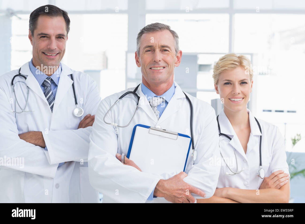 Doctors smiling at camera Stock Photo - Alamy