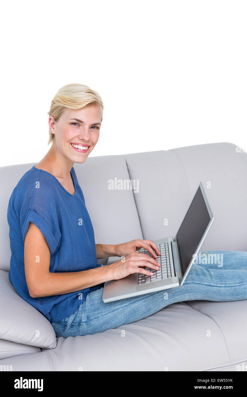 Laptop on couch with white background hi-res stock photography and ...