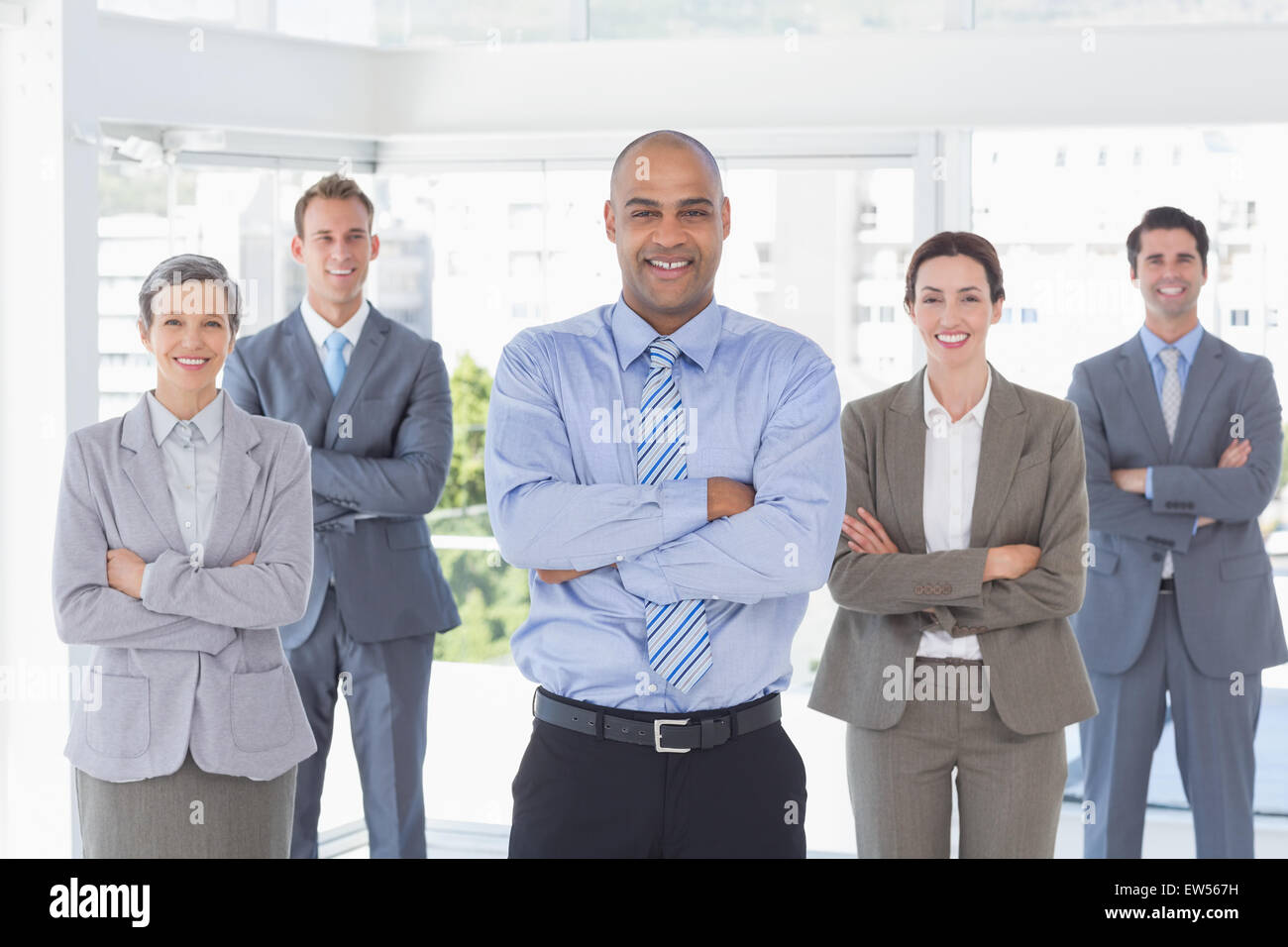 Team smiling hi-res stock photography and images - Alamy