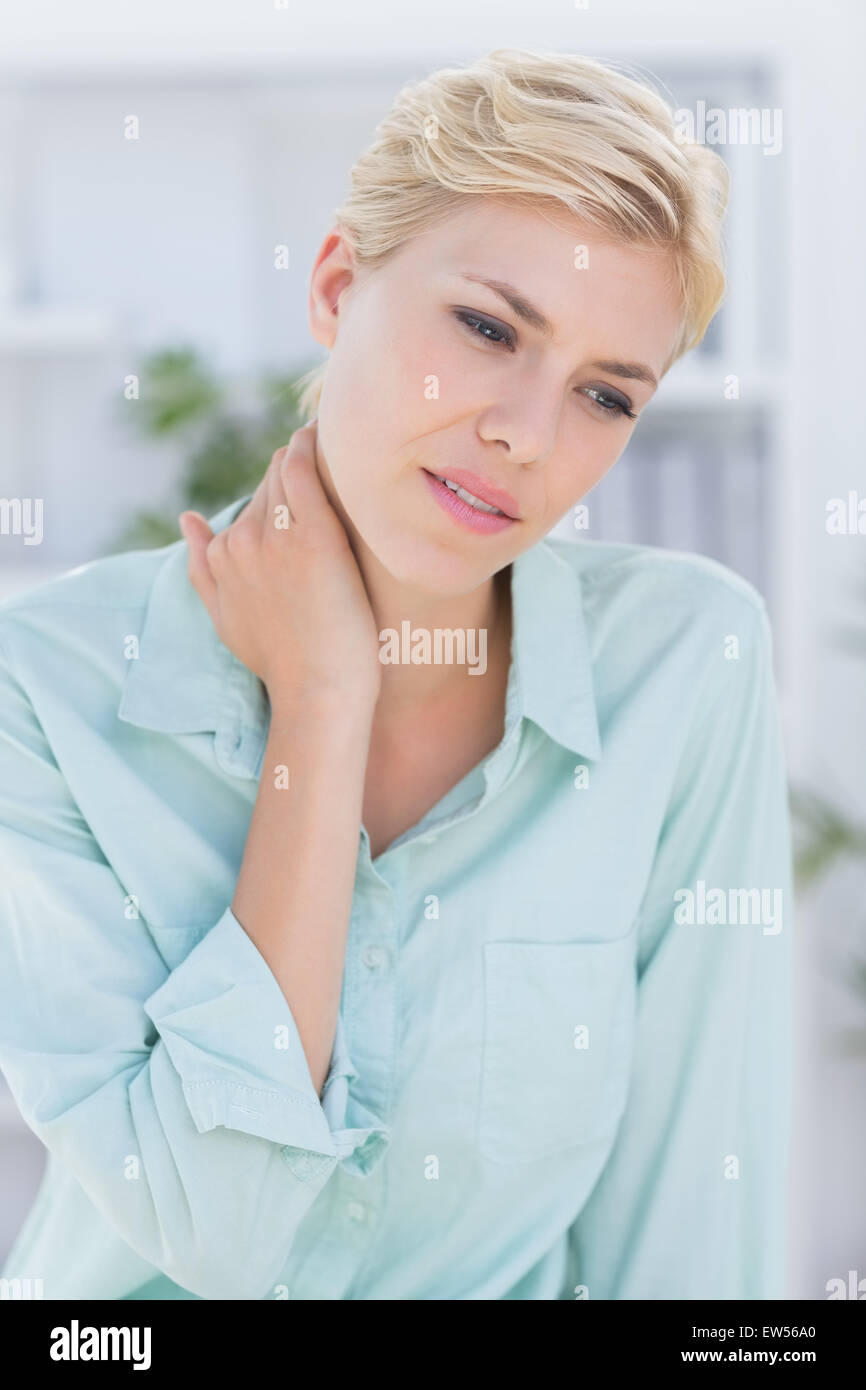 Patient with neck pain Stock Photo - Alamy