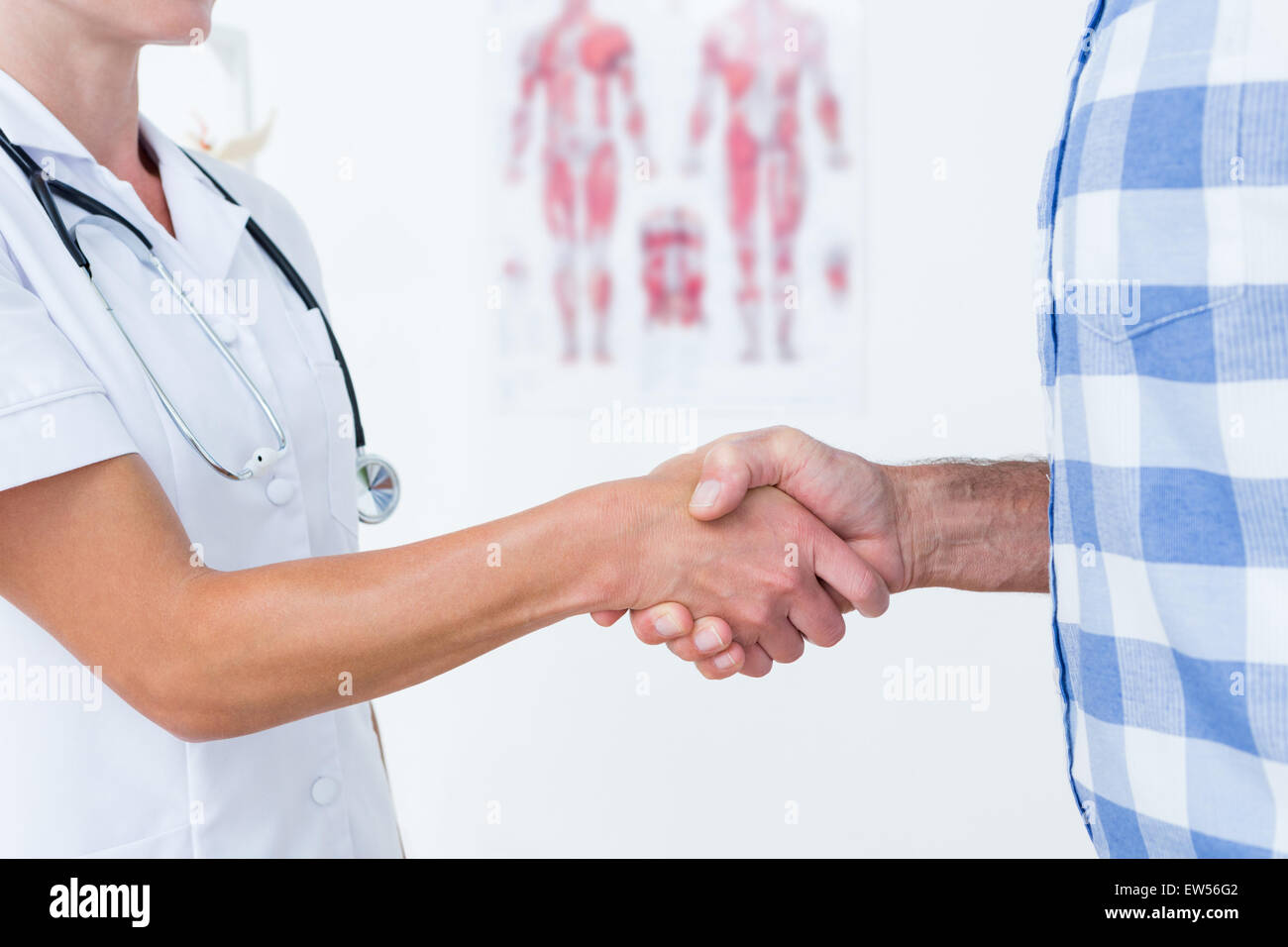 Patient shaking hands with doctor Stock Photo - Alamy