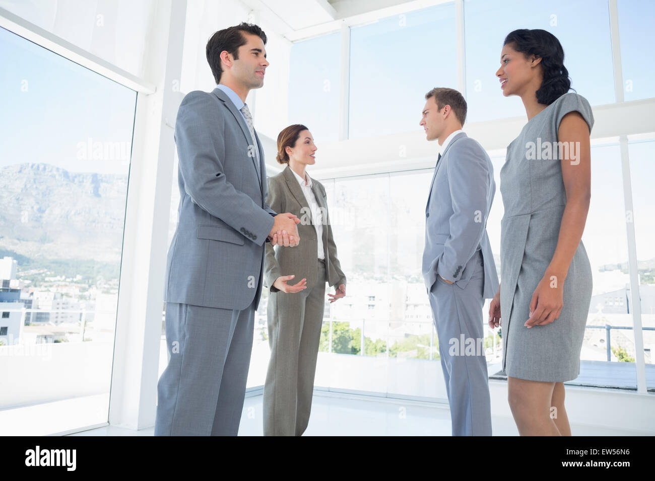 Business team having a conversation Stock Photo - Alamy